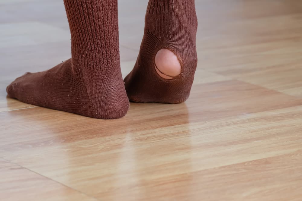 Holes In Socks (10 Reasons & How To Prevent)